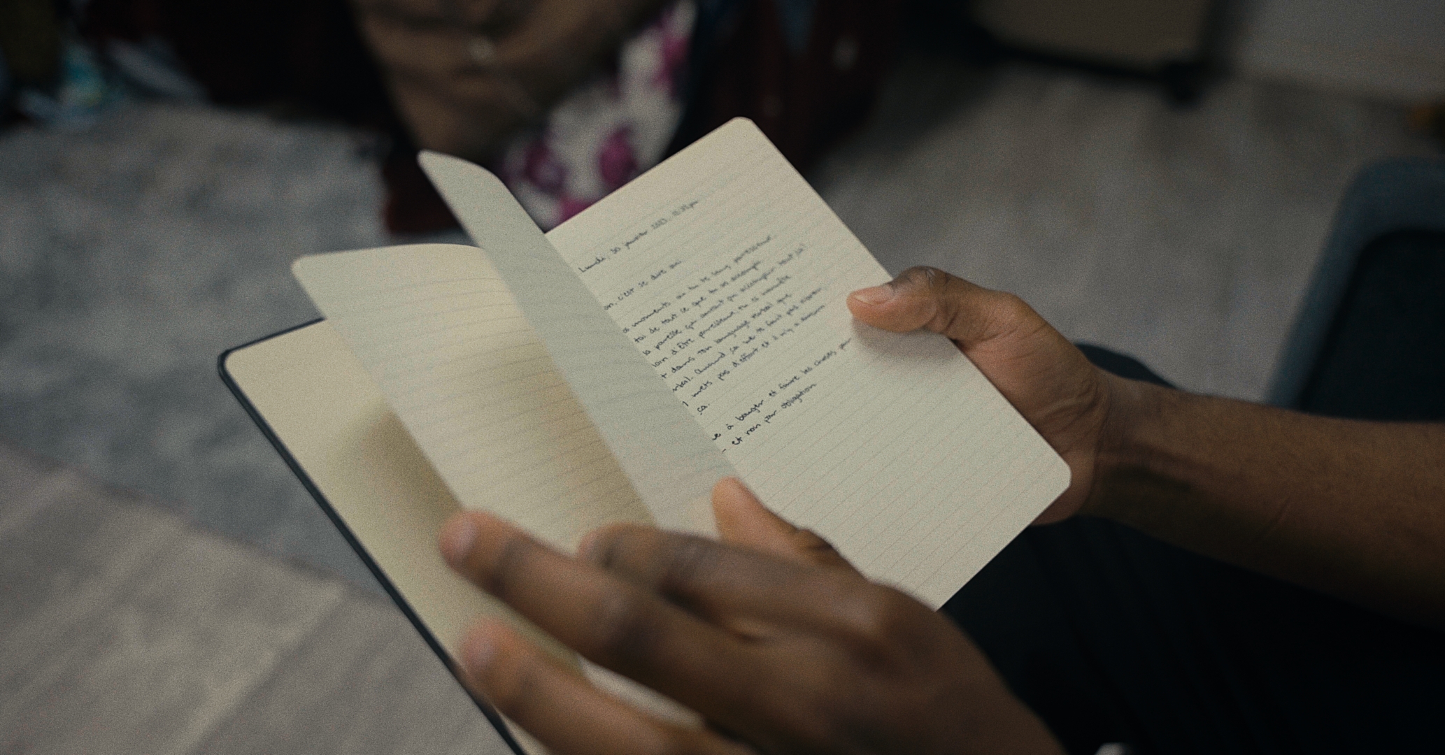 Screen grabs from the “Toujours un peu plus triste” documentary. Color ...