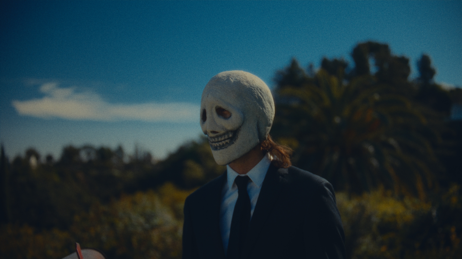 Screen grabs from the “Sad Times” music video by Grace & Moji. Color ...