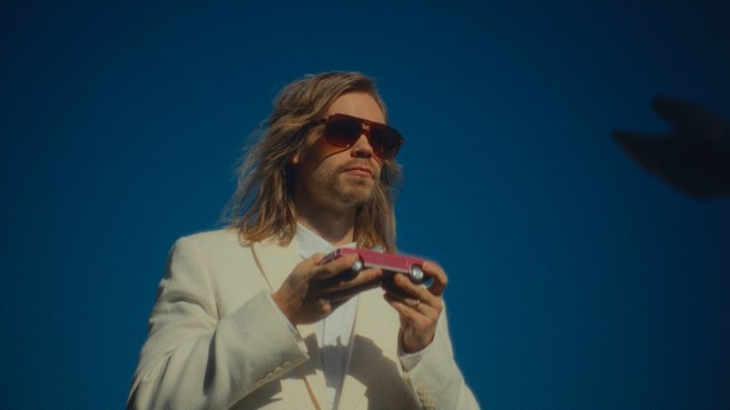 Screen grabs from the “Sad Times” music video by Grace & Moji. Color ...