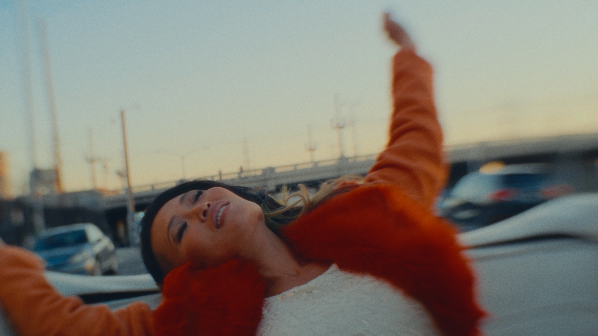 Screen grabs from the “Sad Times” music video by Grace & Moji. Color ...